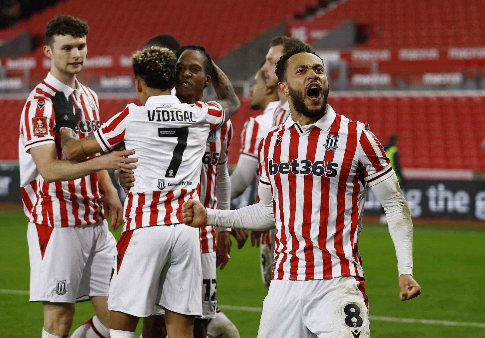 Stoke City: Mark Robins' contract hint amid Lewis Baker praise